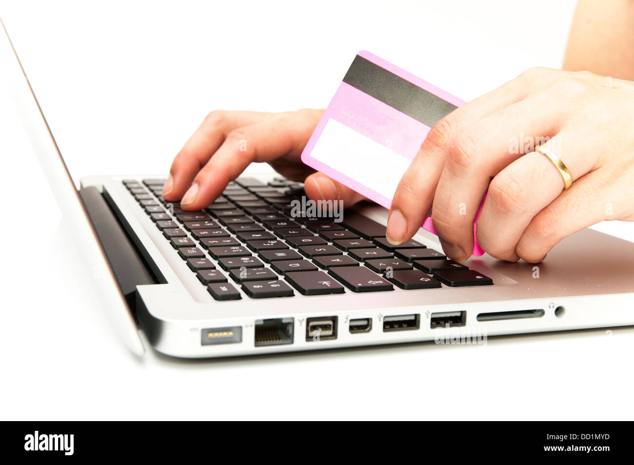 hand with computer and credit card on a white background Stock Photo ...