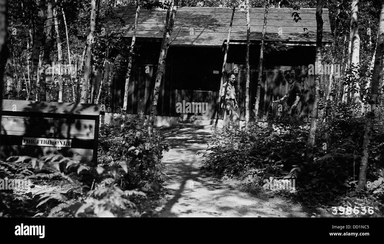 This image shows the interior of a bathhouse featuring lavatories ...