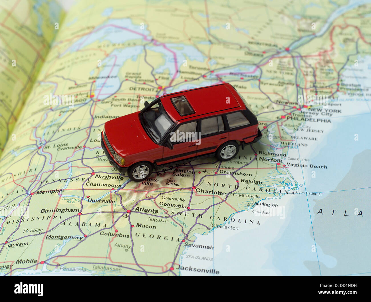 Car on a road map Stock Photo - Alamy