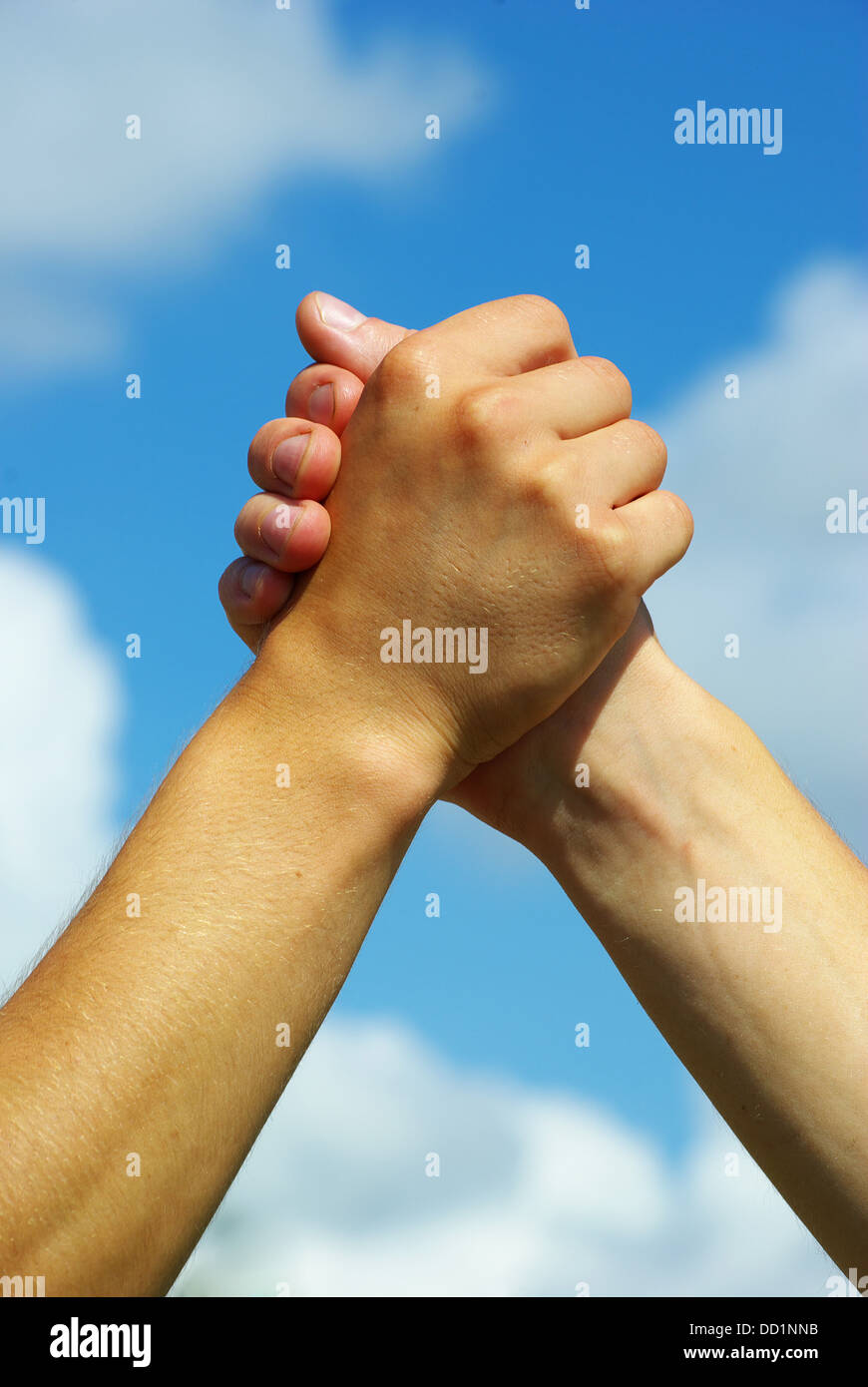 Hand in a hand Stock Photo - Alamy