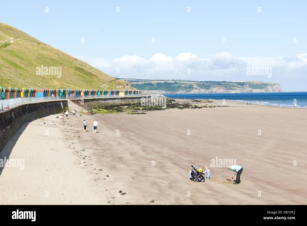Beach huts and the beach at Whitby, north Yorkshire, England Stock ...