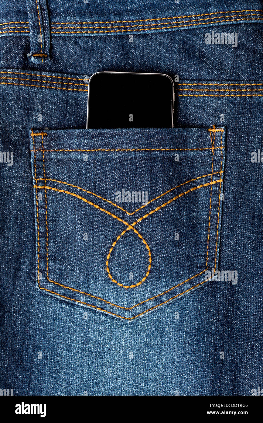Mobile phone in denim jeans back pocket Stock Photo - Alamy