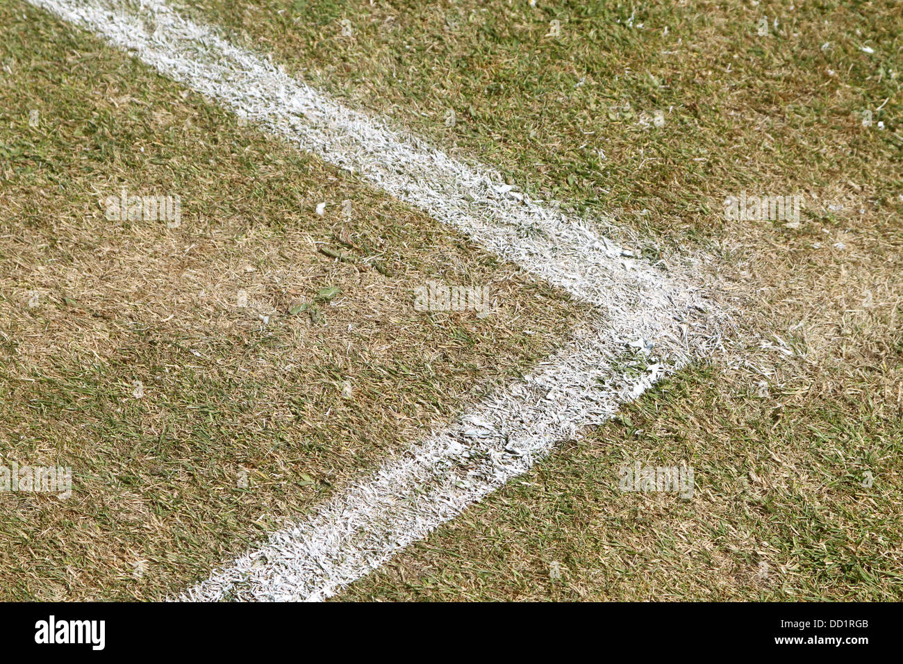 Burnt grass on a football pitch Stock Photo - Alamy