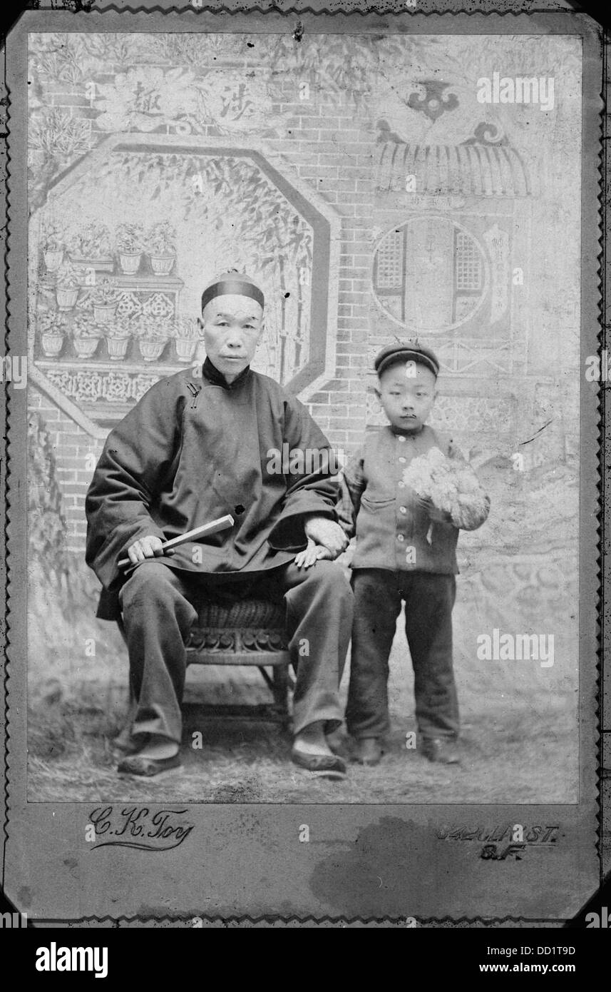 This photograph shows Chun Jan Yut with his father, Chun Duck Chin. The ...