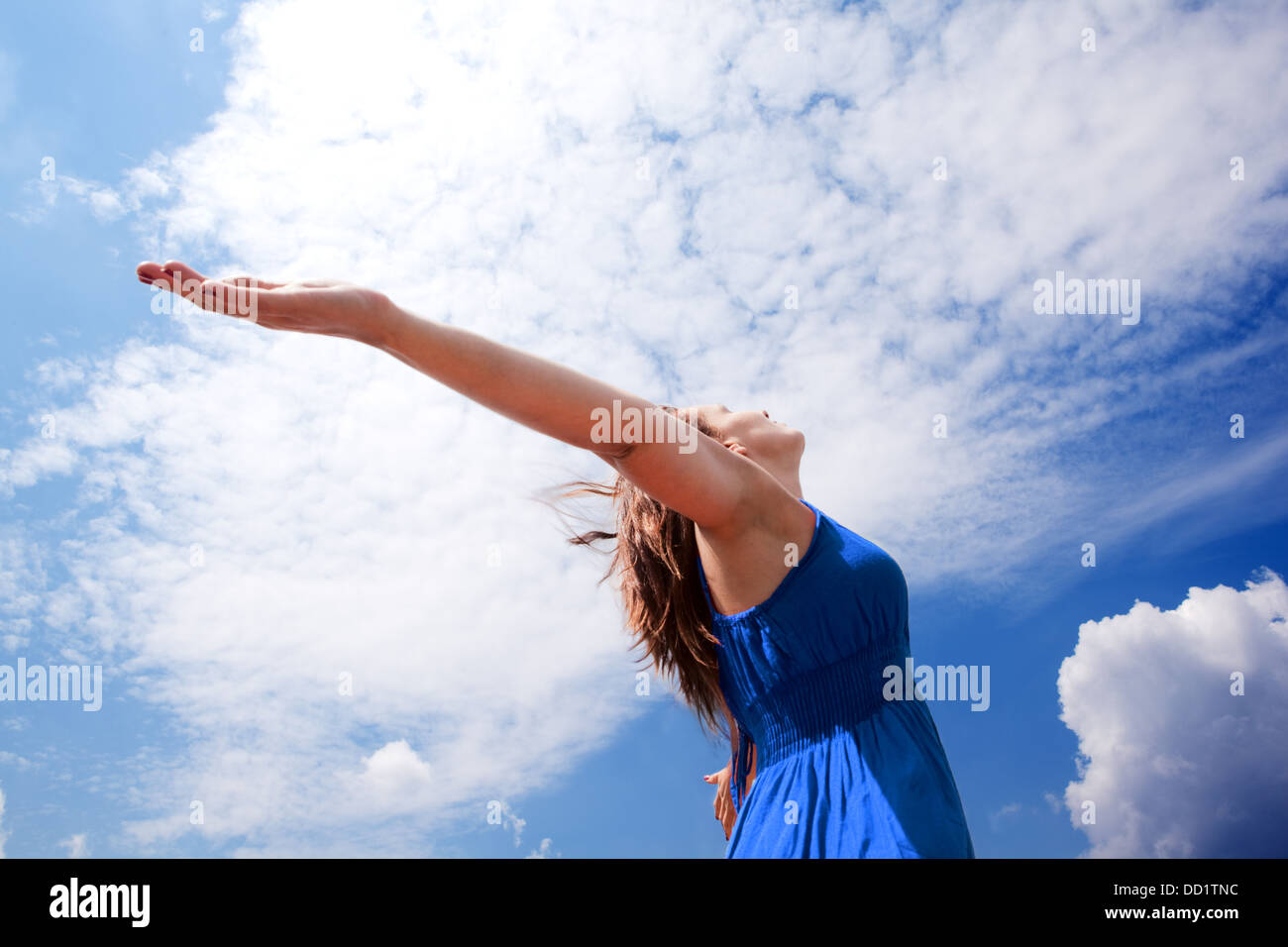 Girl and sky Stock Photo - Alamy