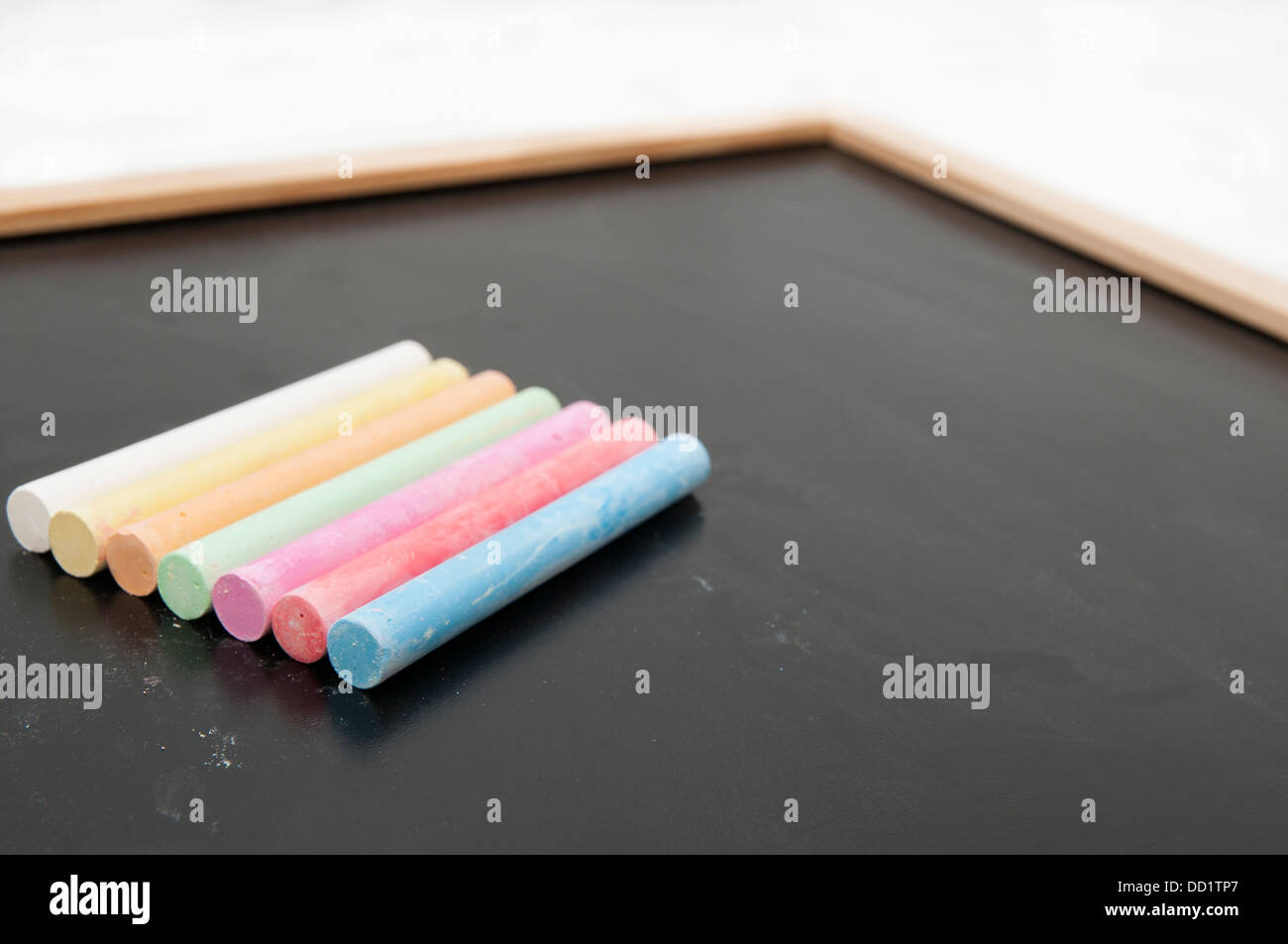 blackboard with chalk in various colors Stock Photo - Alamy