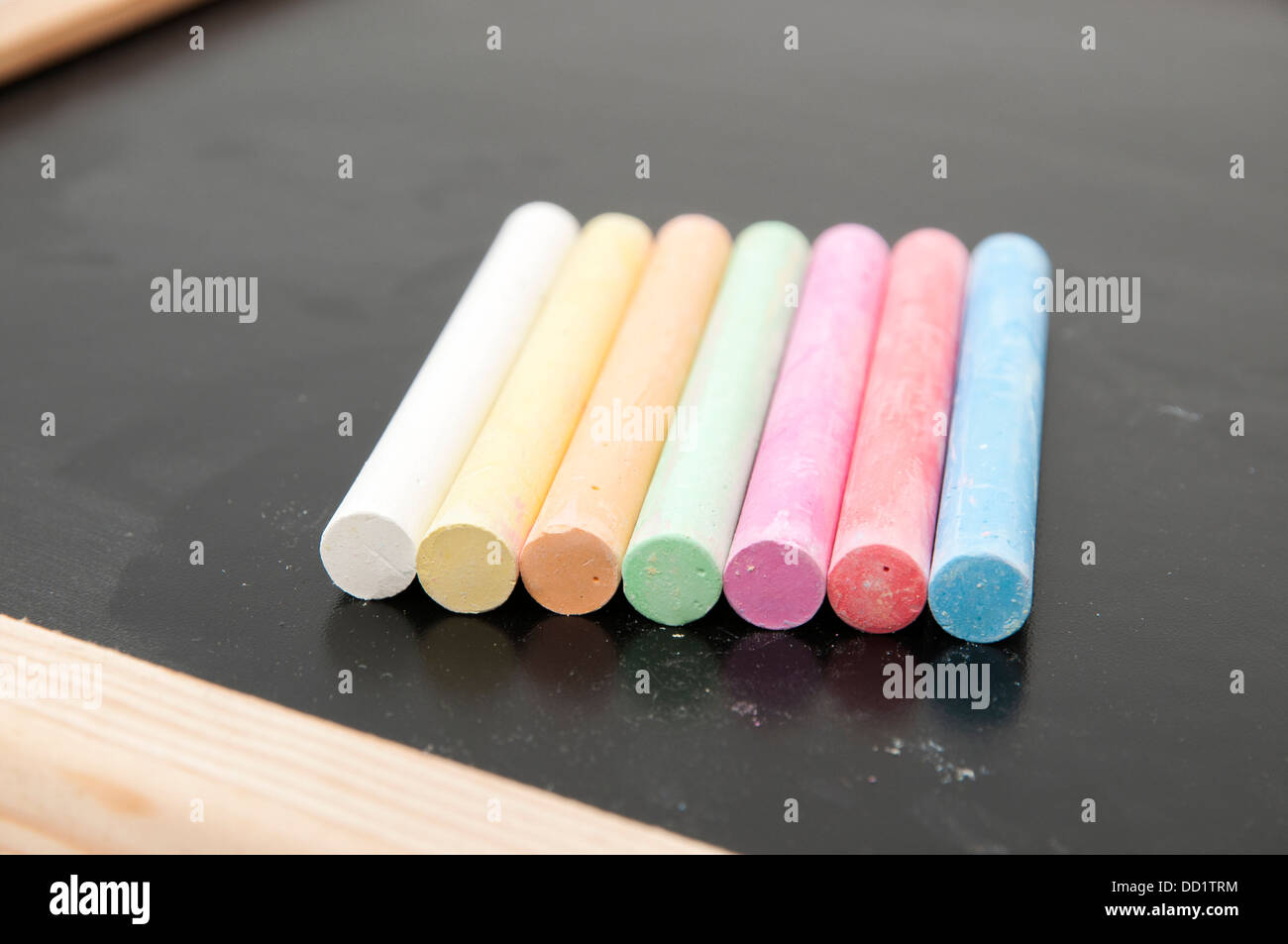 blackboard with chalk in various colors Stock Photo - Alamy
