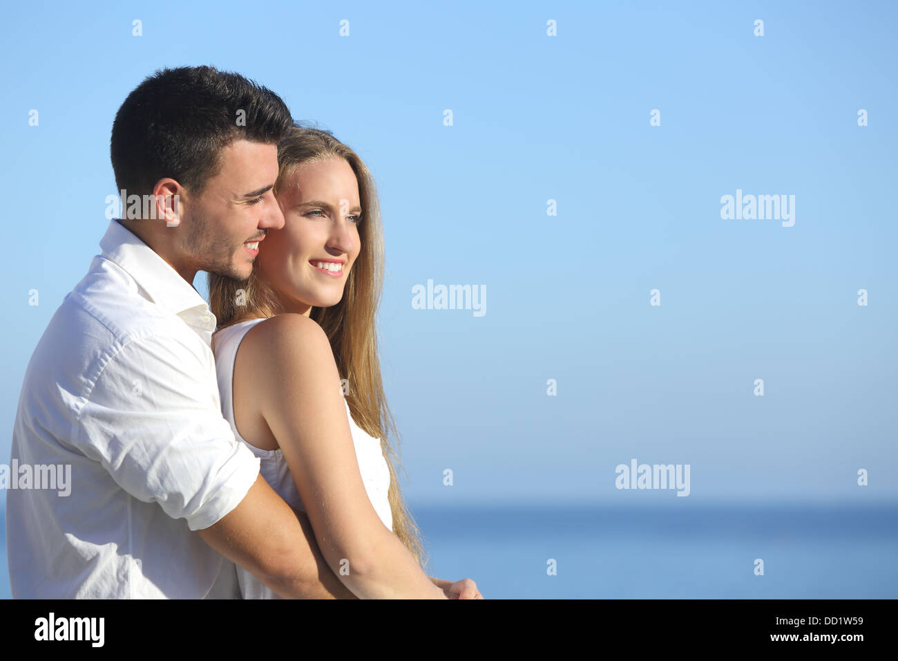 Teen couple cuddling hi-res stock photography and images - Alamy