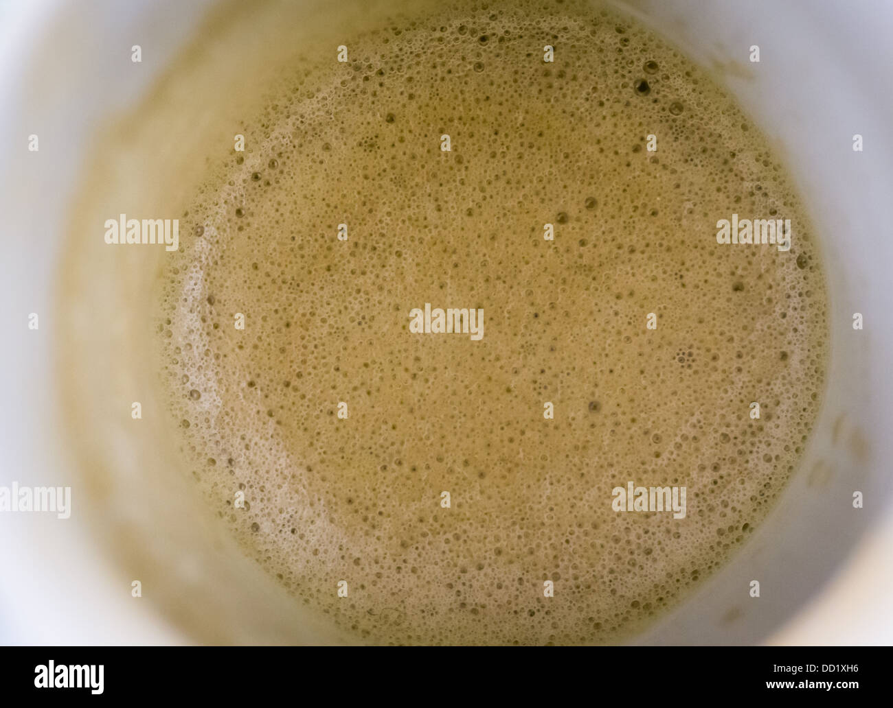 Coffee foam viewed from top - Closeup image Stock Photo - Alamy