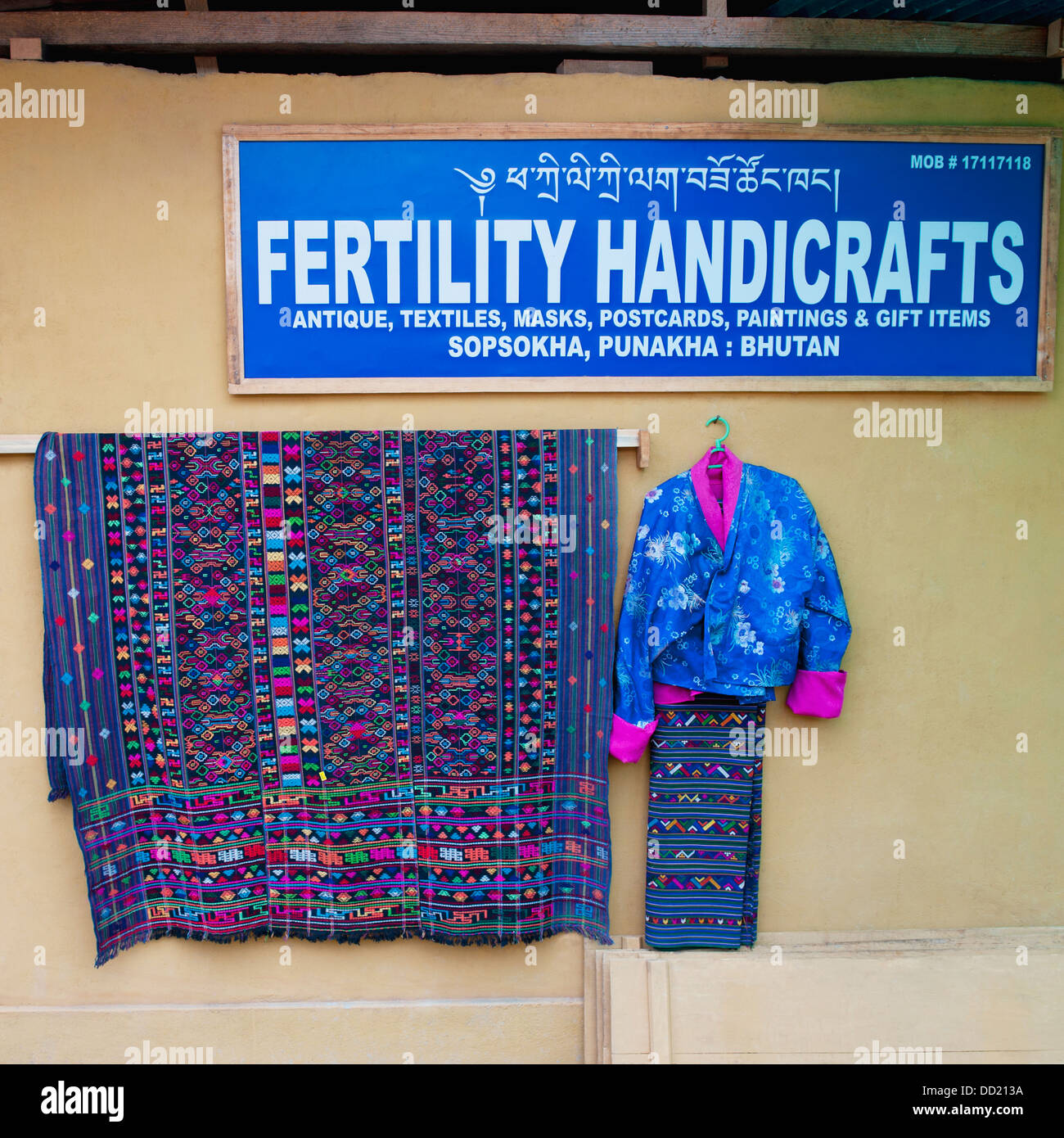 A Sign For Handicrafts And A Display Below; Punakha District Bhutan ...