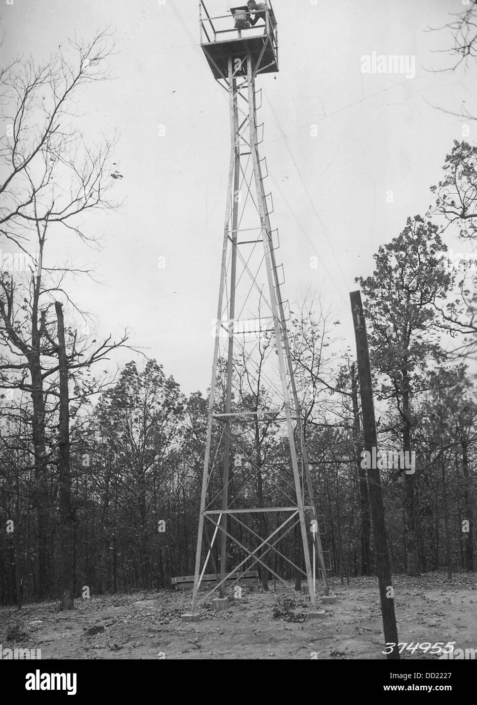 The Hicks Emergency Lookout Tower, located in a mountainous region, was ...