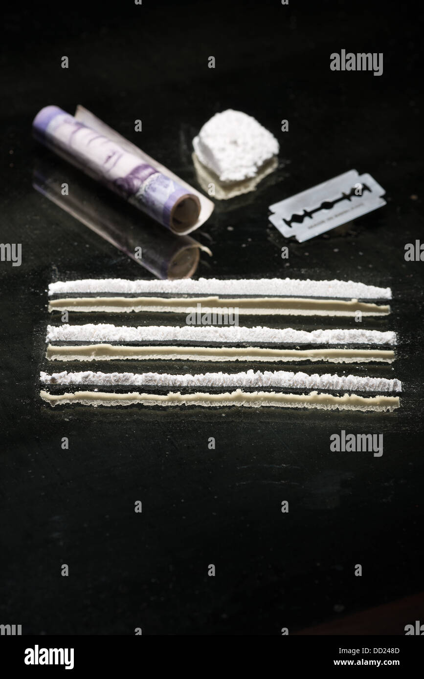 Drug addiction lines rows of powdered cocaine ready to be snorted ...