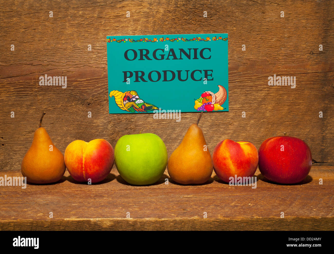 Variety Of Fruit In A Row On A Wooden Shelf With An Organic Produce ...