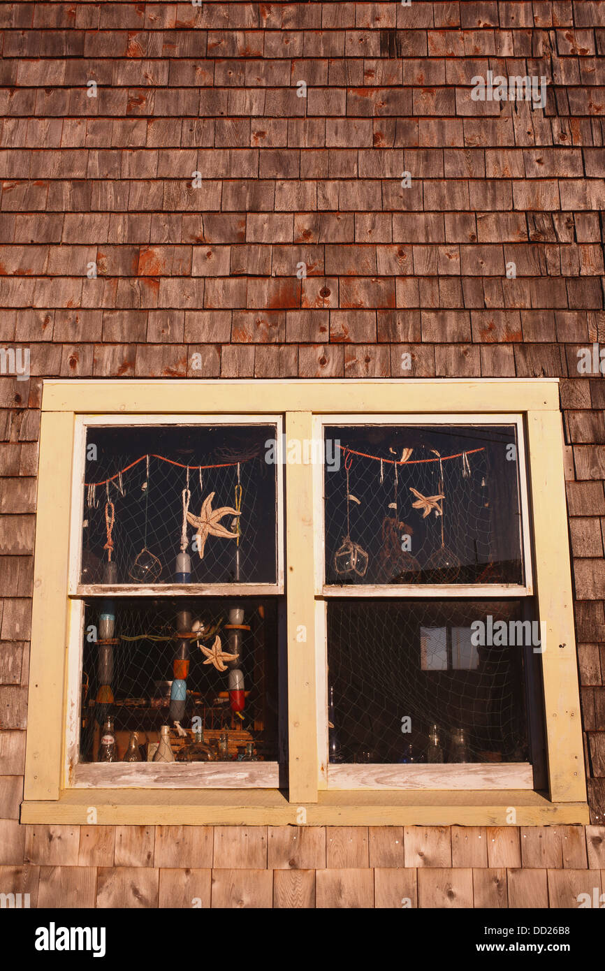 Decorative window with a nautical theme on old wooden wall Stock Photo ...