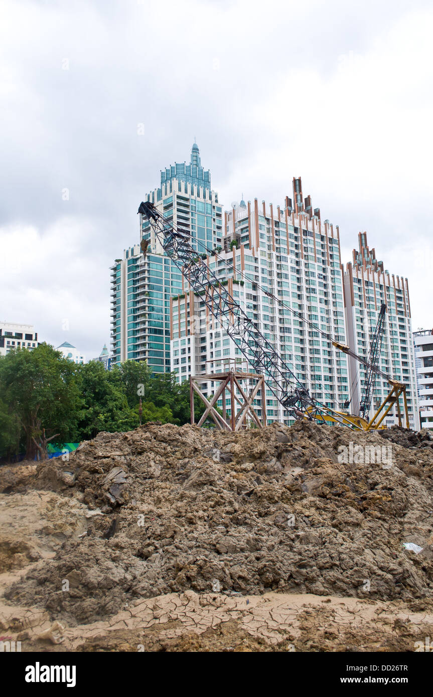 crane for construction with modern building background Stock Photo - Alamy