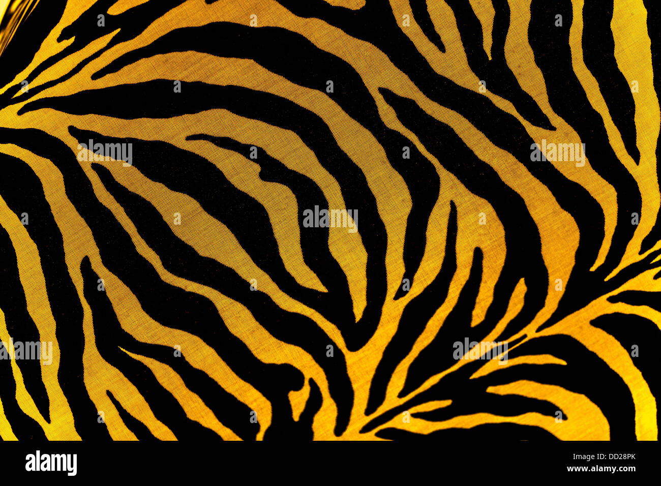 A close up of a tiger printed lamp shade. Taken March 2013. There are 3 ...