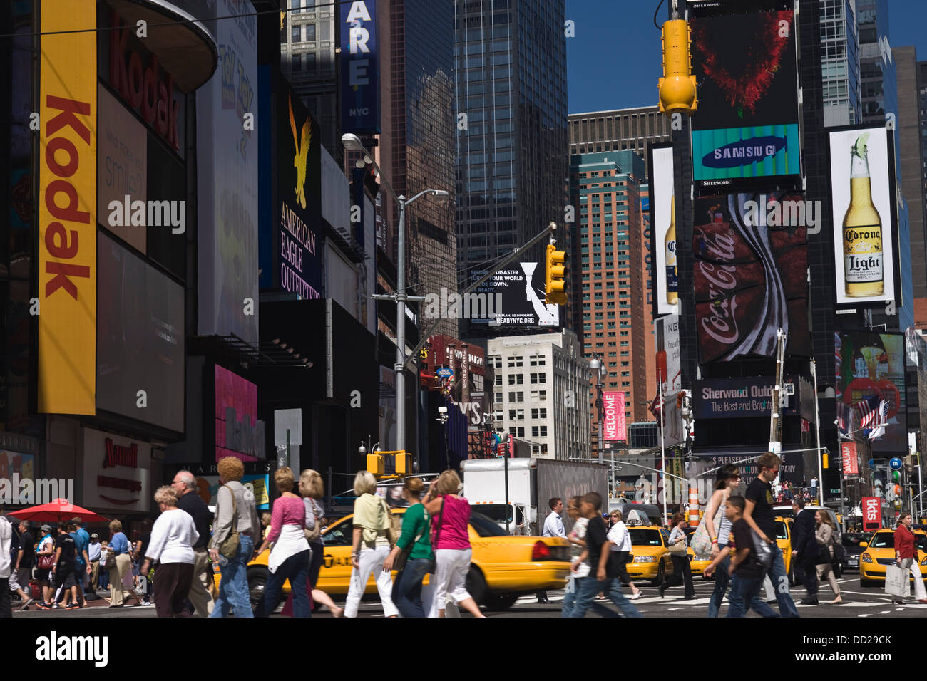 CROWDS CROSSING STREET INTERSECTION TIMES SQUARE MANHATTAN NEW YORK USA ...