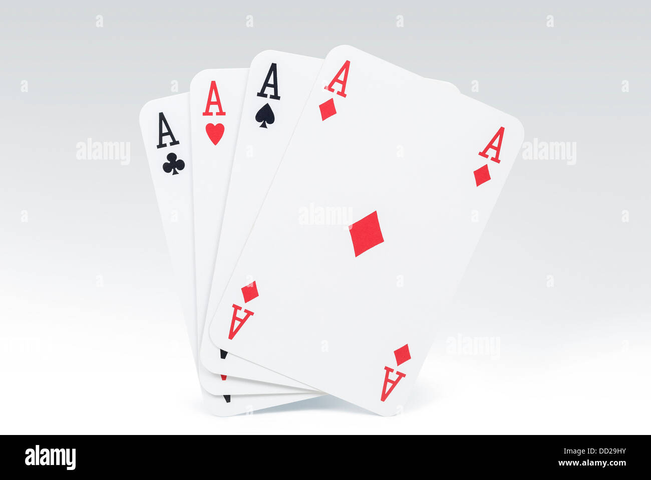 Four aces in hand cards hi-res stock photography and images - Alamy