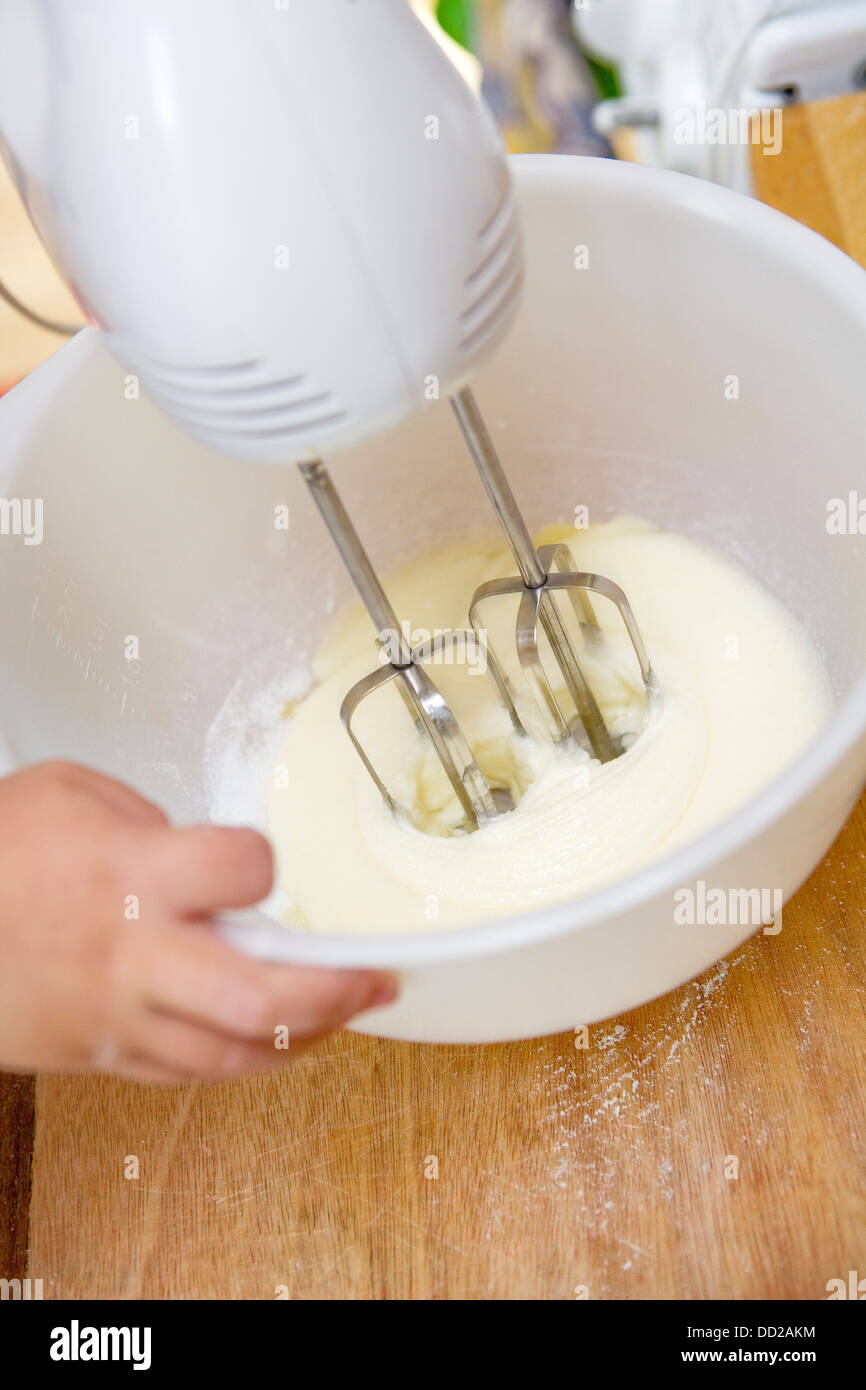 Making a cake Stock Photo - Alamy