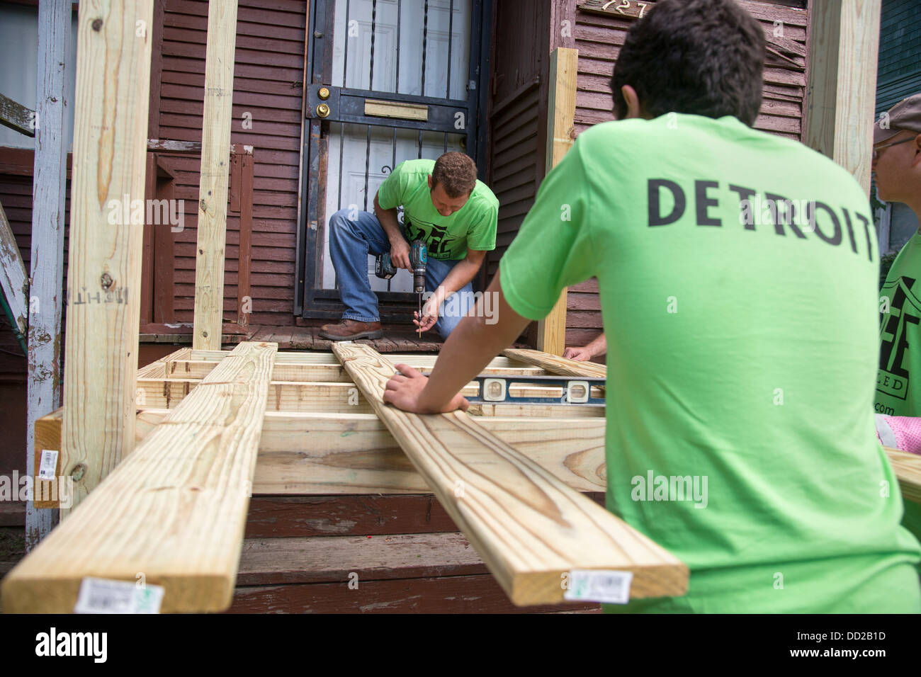 Volunteers participate in community improvement projects in Detroit ...