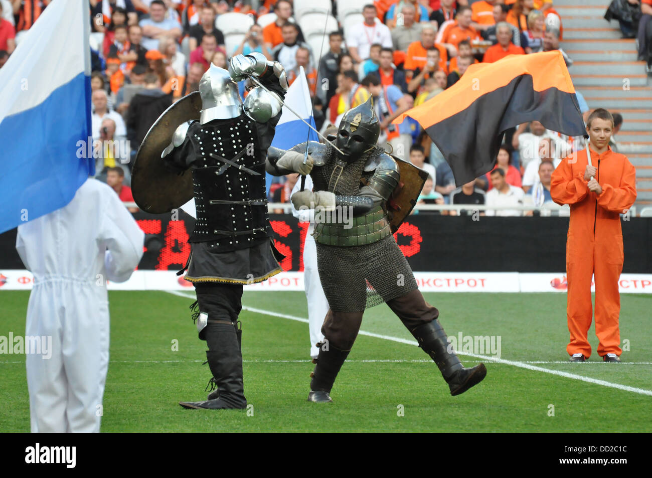 Knights in armor on the football field are involved in a modular show ...