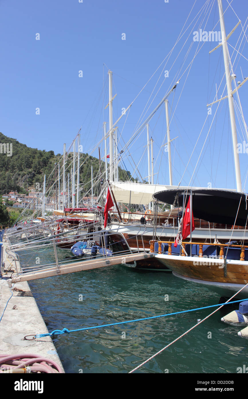 Yachts and boats moored in the port of Fethiye in Turkey Stock Photo ...