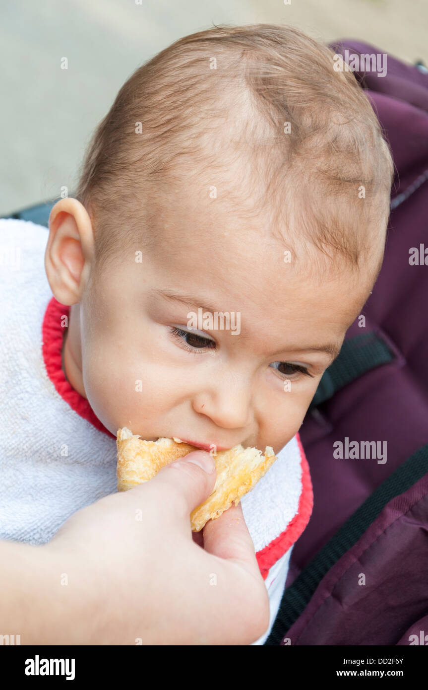 Child pastry eating outdoor hi-res stock photography and images - Alamy
