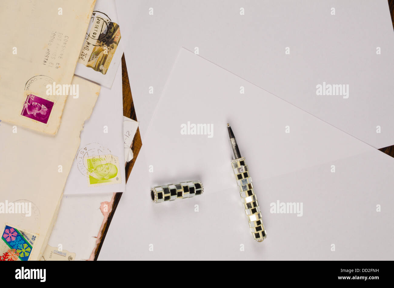 Old letters together with some writing paper, a background Stock Photo ...