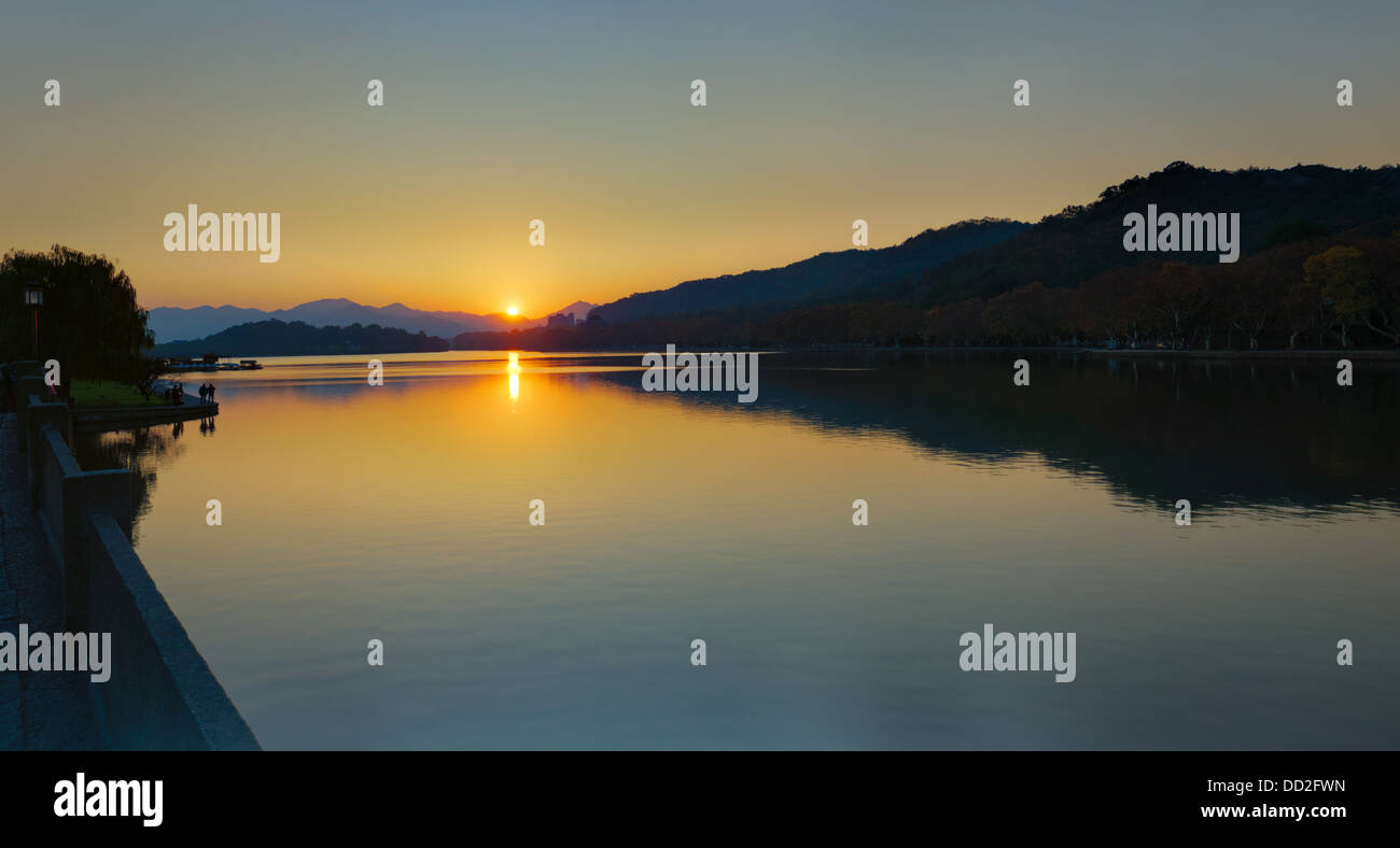 Hangzhou, China's West Lake at sunset Stock Photo - Alamy