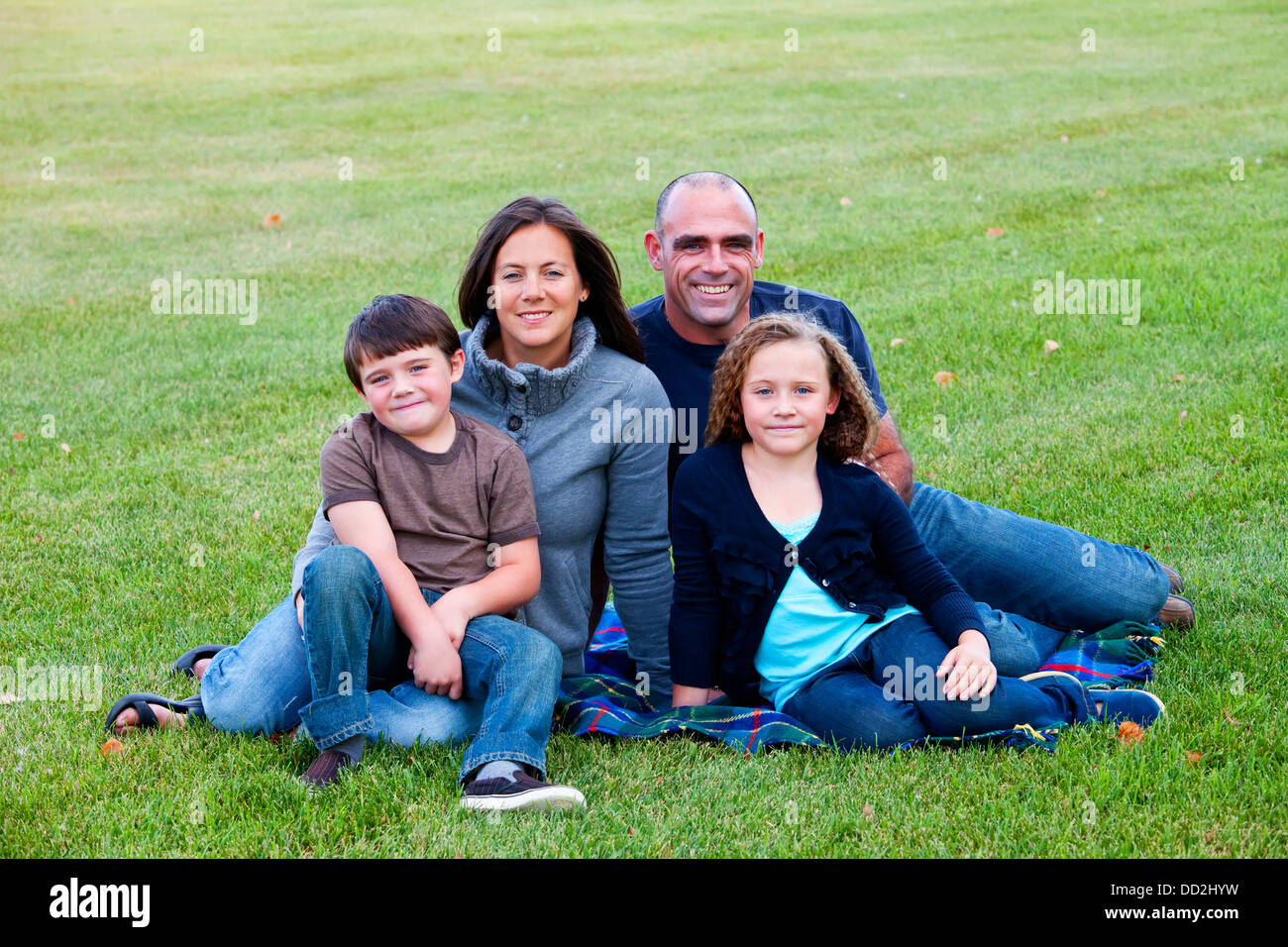 Family Portrait In A Park; Beaumont, Alberta, Canada Stock Photo - Alamy