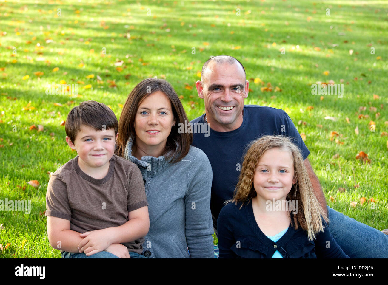 Family Portrait In A Park; Beaumont, Alberta, Canada Stock Photo - Alamy