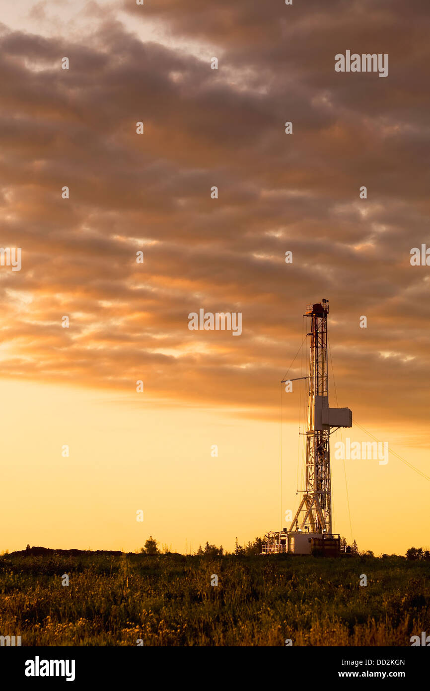 Drilling Rig With Dramatic Clouds At Sunrise East Of Fort Saskatchewan ...