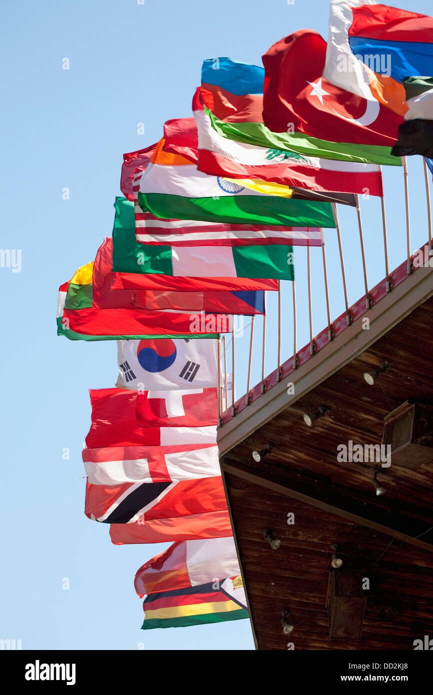 Close Up Of Flags Of Countries Of The World On Top Of A Building; Port ...
