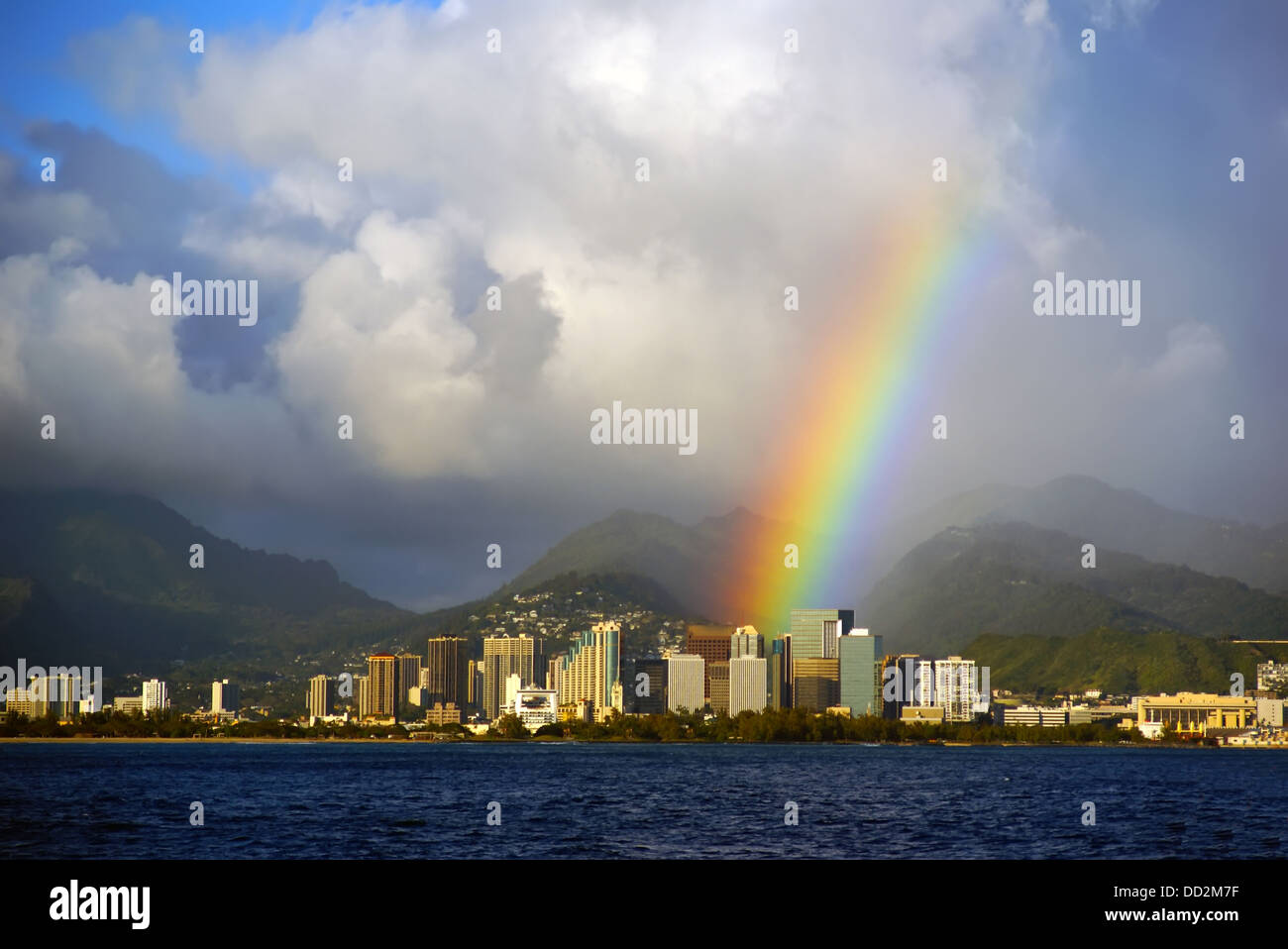 Honolulu Hawaii with a bright rainbow after a rain stom seen from the ...