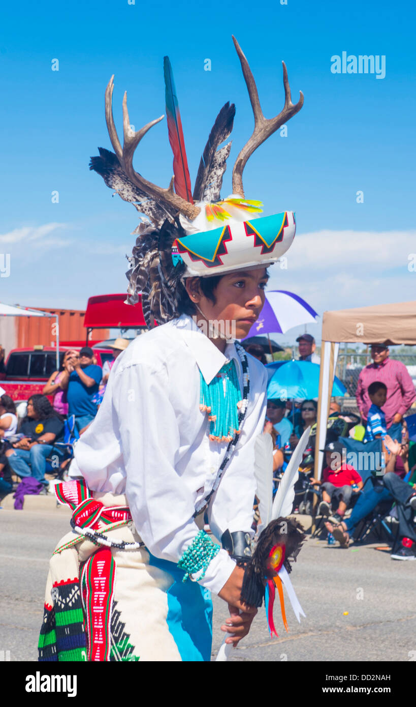 Native American with traditional costume participates at the 92 annual ...