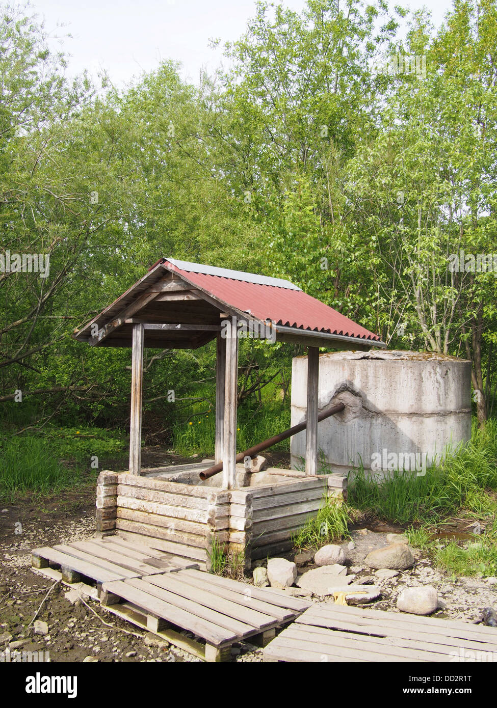 Spring water pipe Stock Photo - Alamy