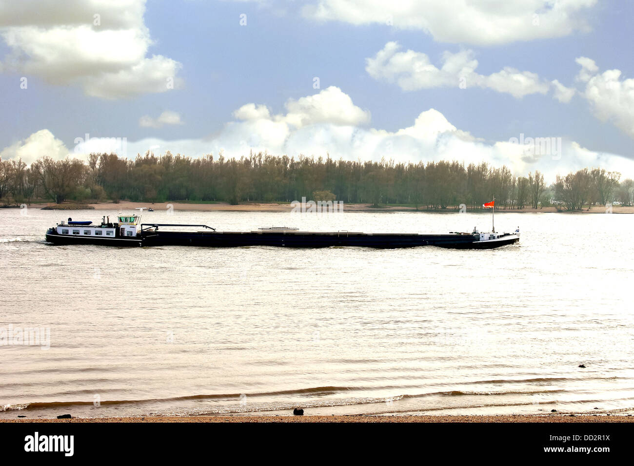 The loaded barge at sunset. Gorinchem. The Netherlands Stock Photo - Alamy