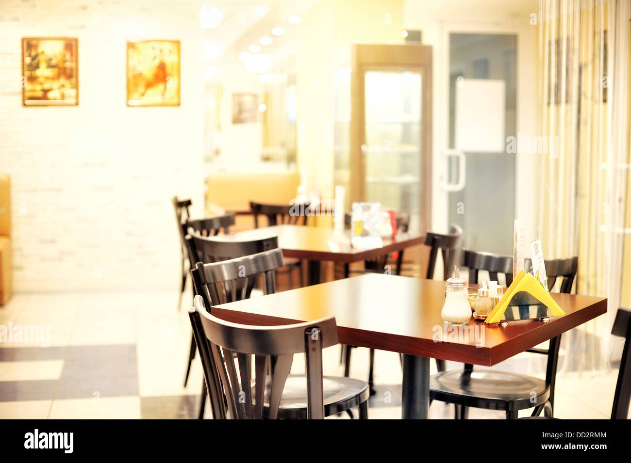 Empty tables in a small cafeteria Stock Photo - Alamy