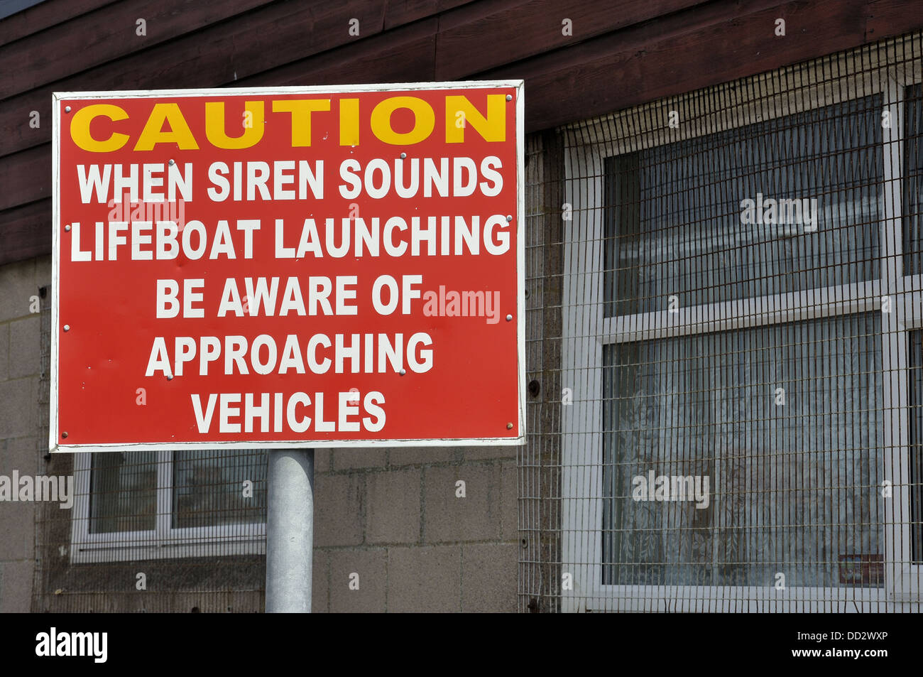 Caution sign for lifeboat Stock Photo - Alamy