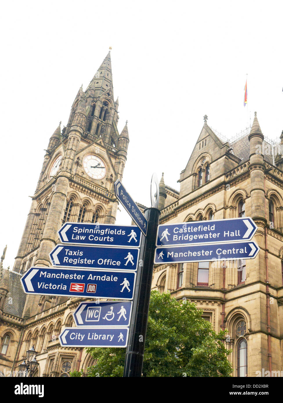 Street signs with Town Hall in Manchester UK Stock Photo - Alamy