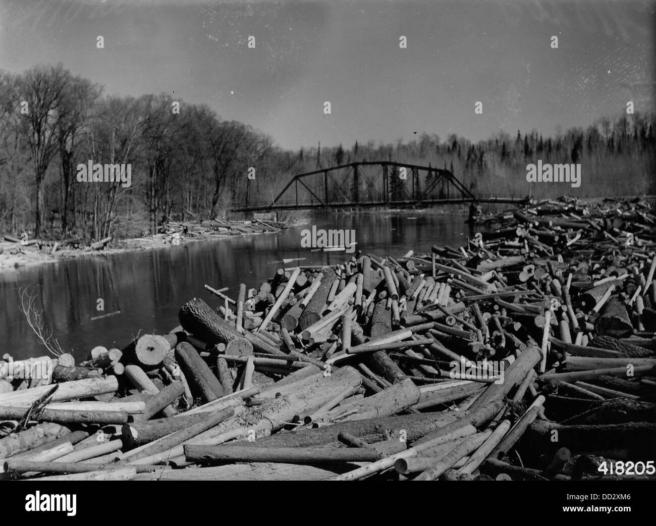 This image shows a receded river, likely captured after a period of low ...