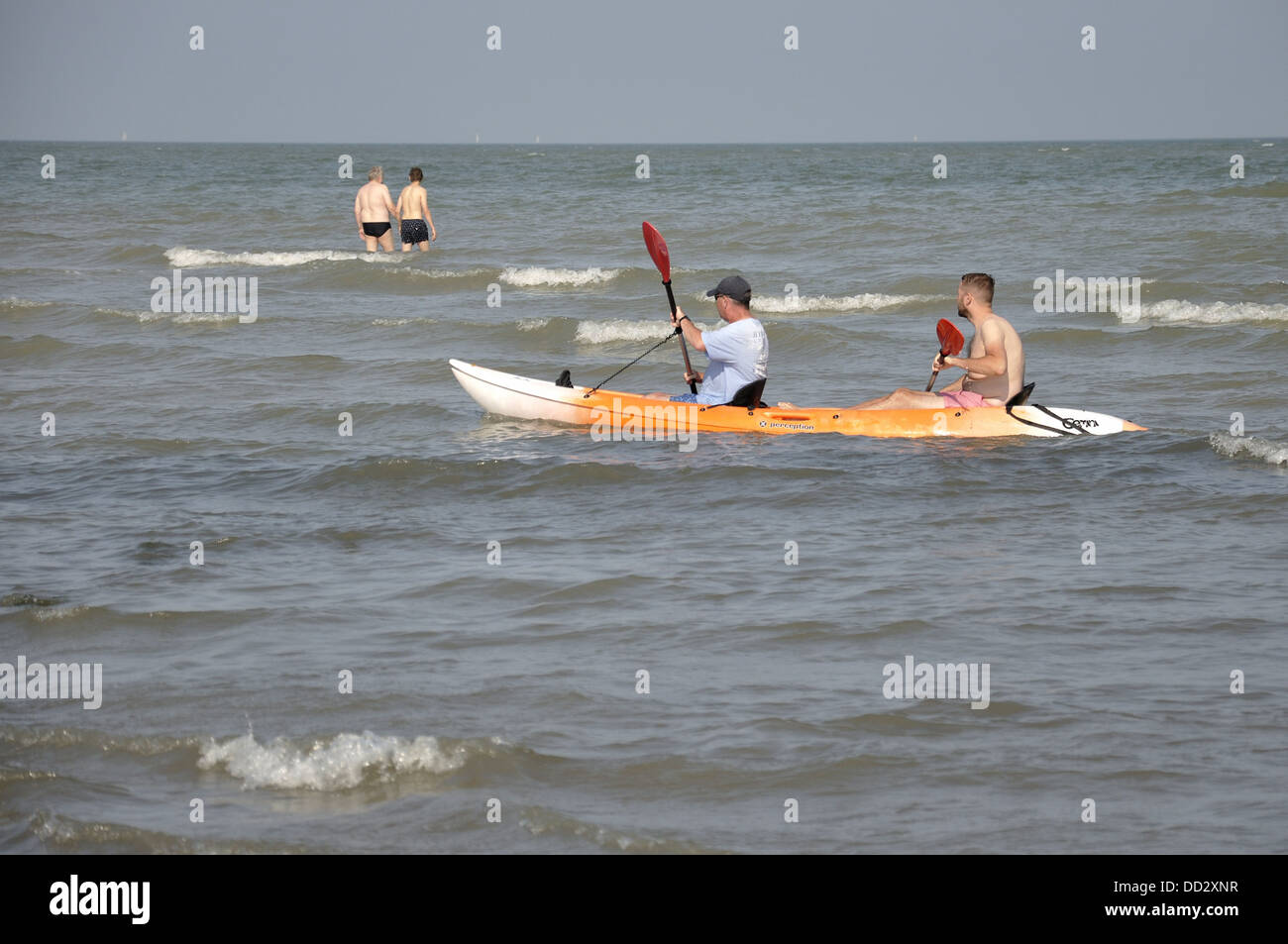 Two people wading in hi-res stock photography and images - Alamy