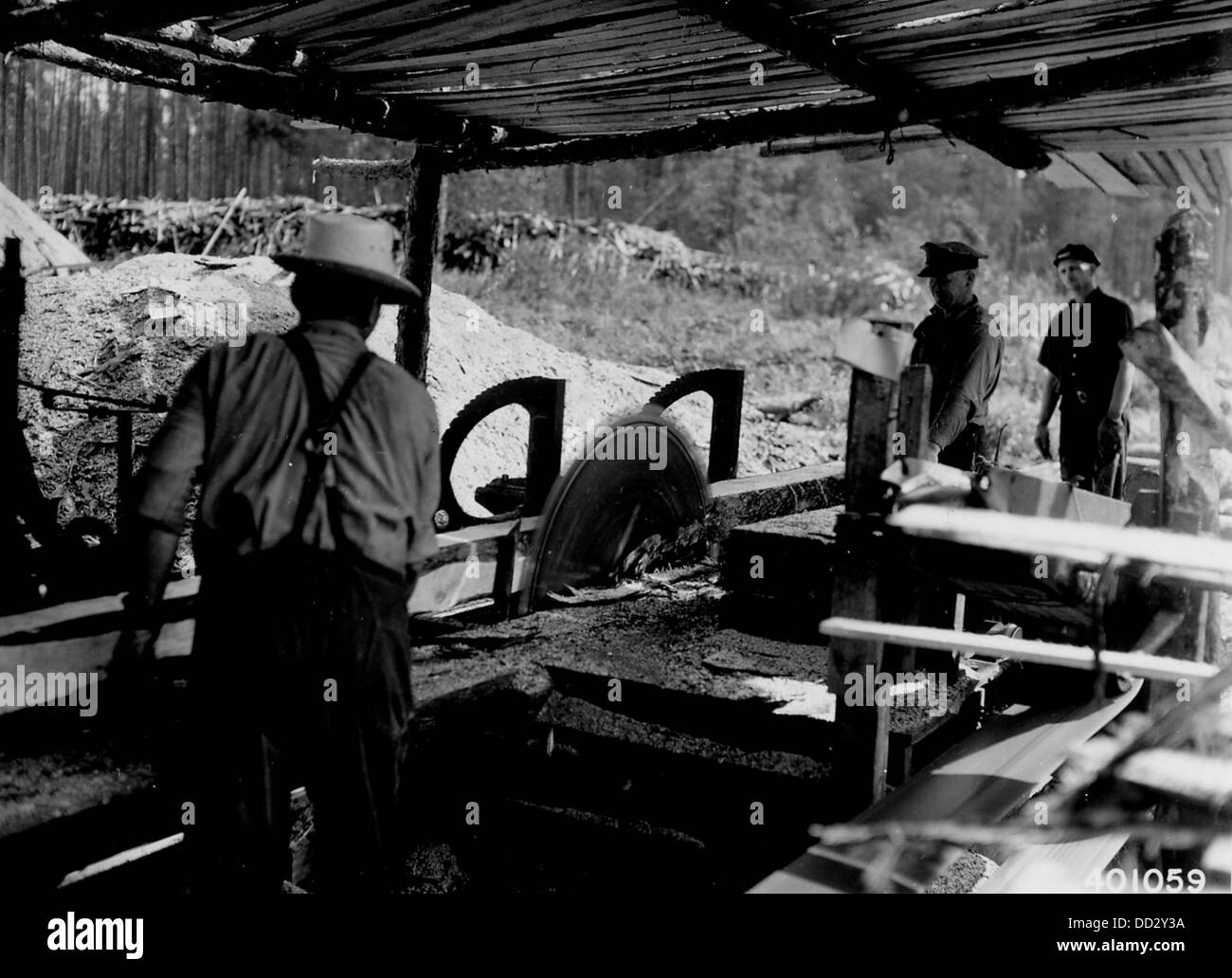 Sawing timber Black and White Stock Photos & Images - Alamy