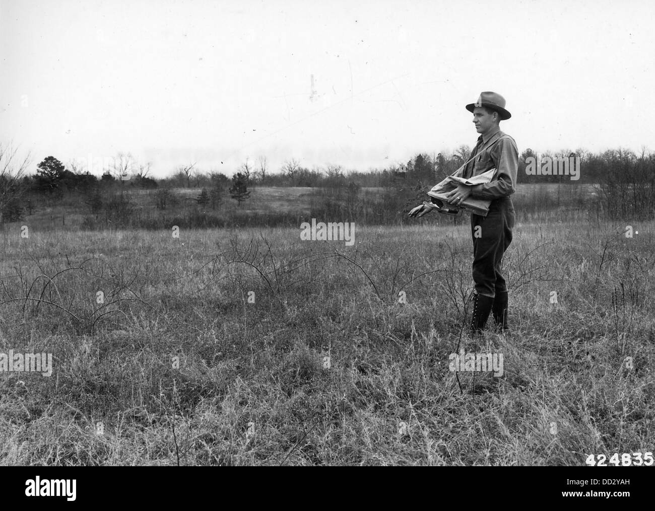 Lespedeza, a forage legume, is being seeded in an agricultural field ...