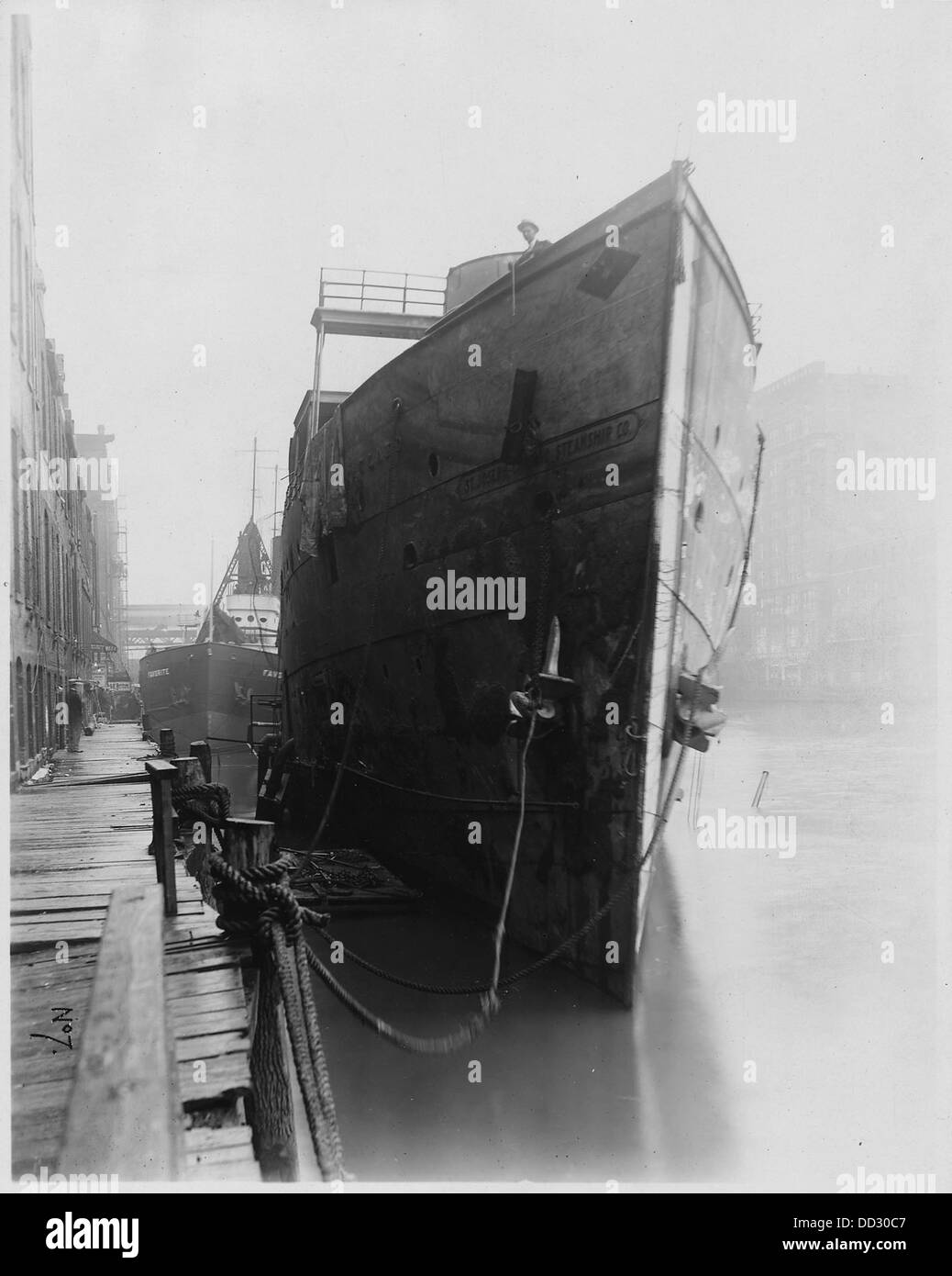 The Eastland, a passenger ship, is seen upright at port. This image ...