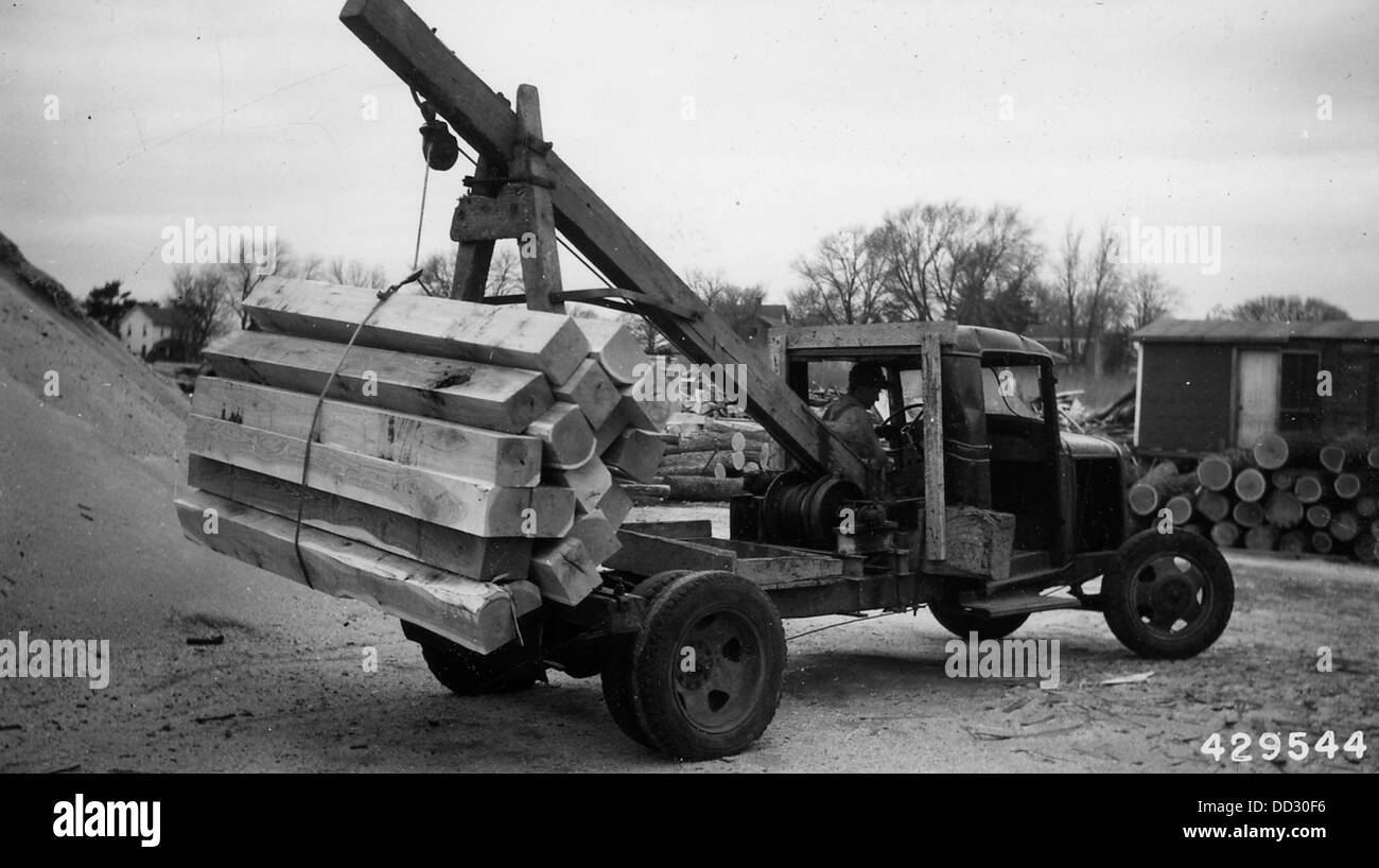 A photograph showing ties being loaded out from Red Oak, a location ...