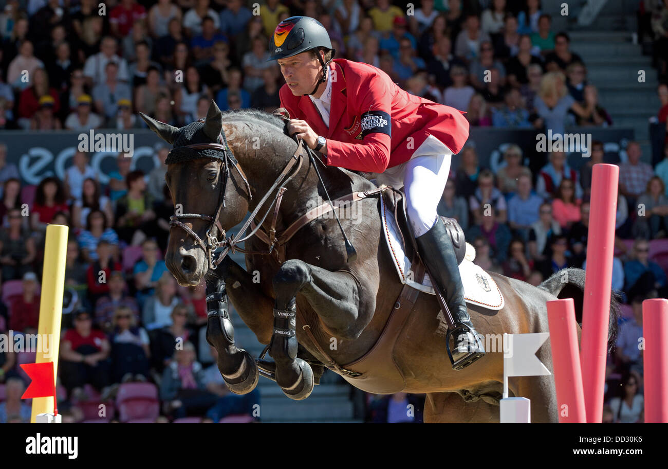 Herning, Denmark. 24th Aug, 2013. German show jumper Christian Ahlmann ...