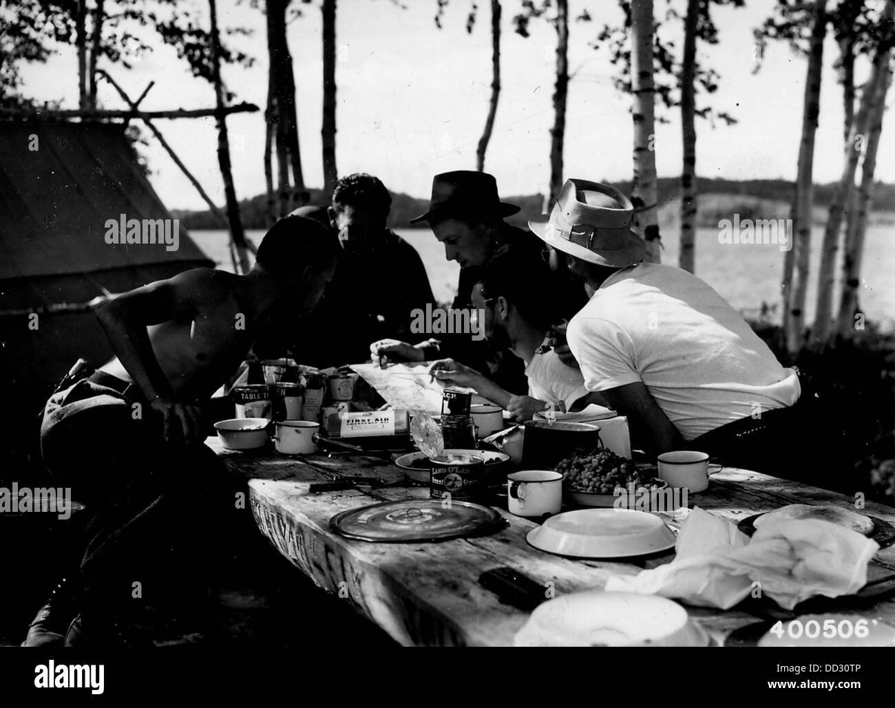 Two forest officers are shown in this image, likely engaged in a ...