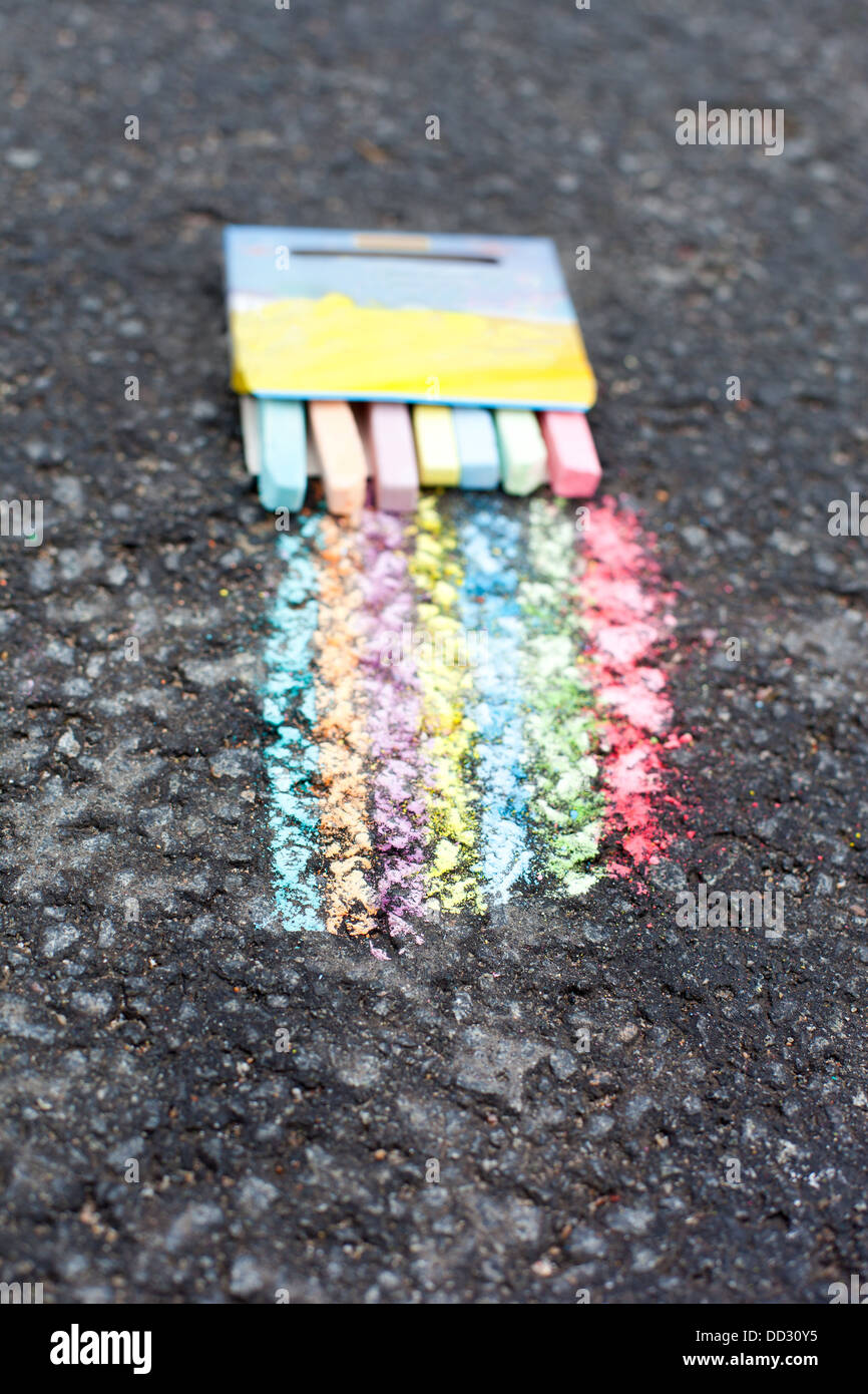 Set of colorful chalk lying on asphalt Stock Photo - Alamy