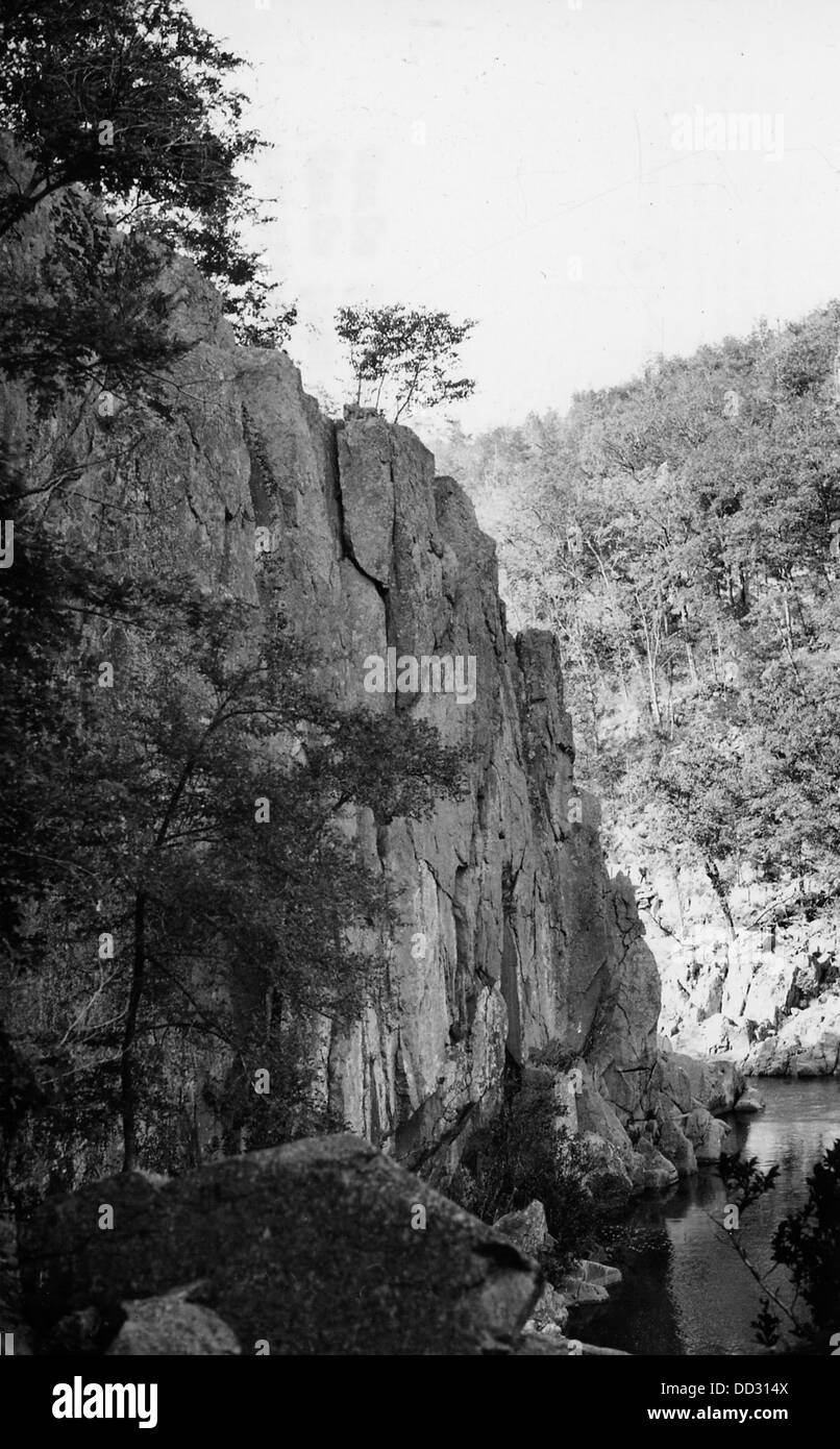 A vertical cliff stands on the west side of Shut-Ins Gorge, viewed from ...